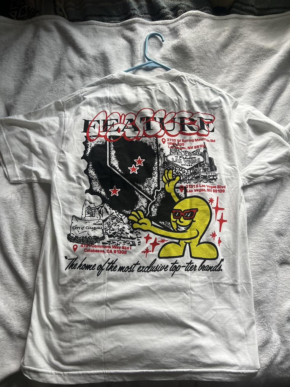 Large Market T-Shirt collab with feature. Very... - Depop