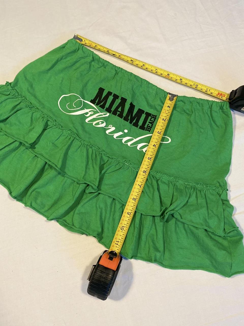 Surf Style green mini skirt with ruffles and graphic... - Depop