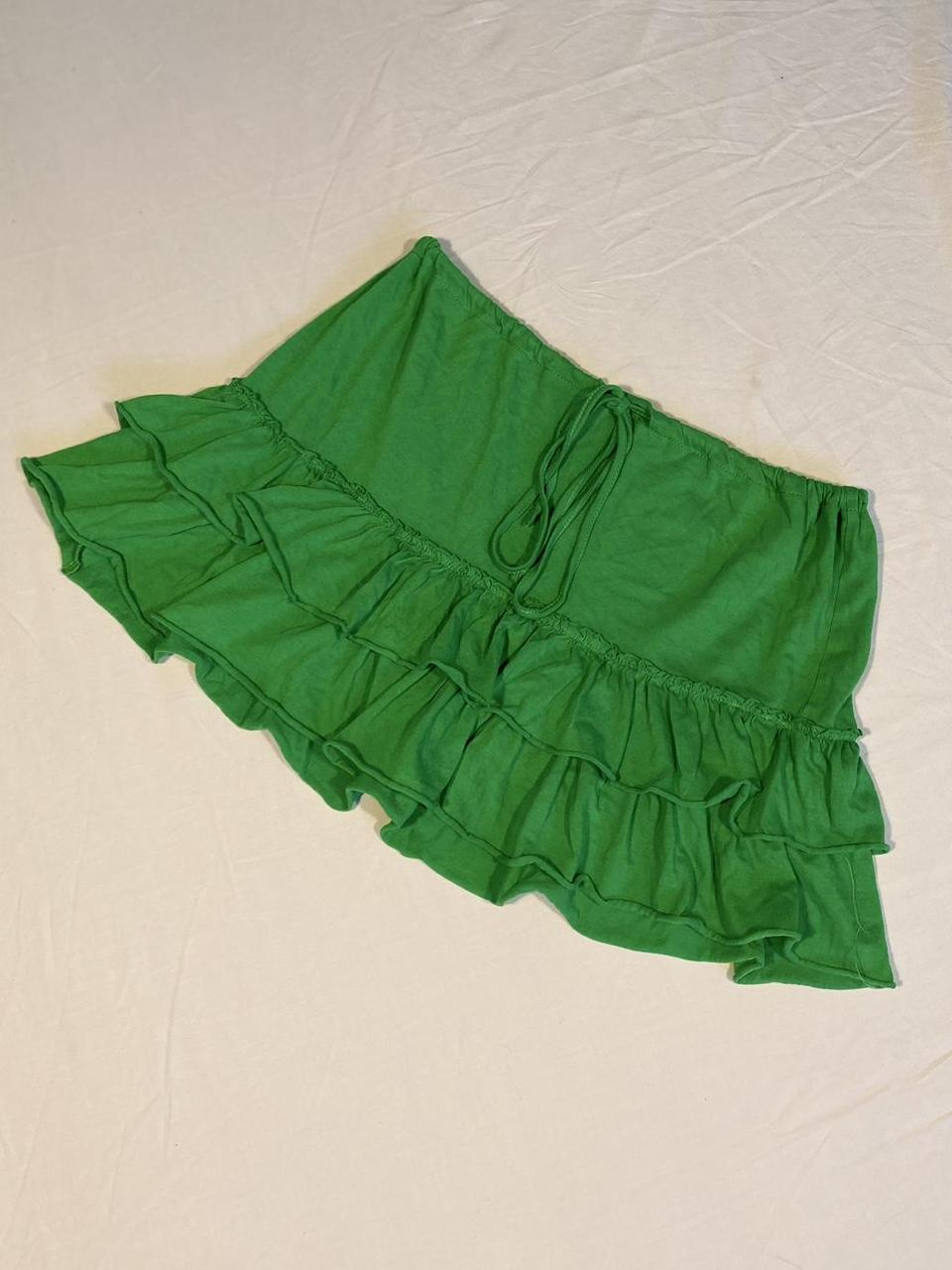 Surf Style green mini skirt with ruffles and graphic... - Depop