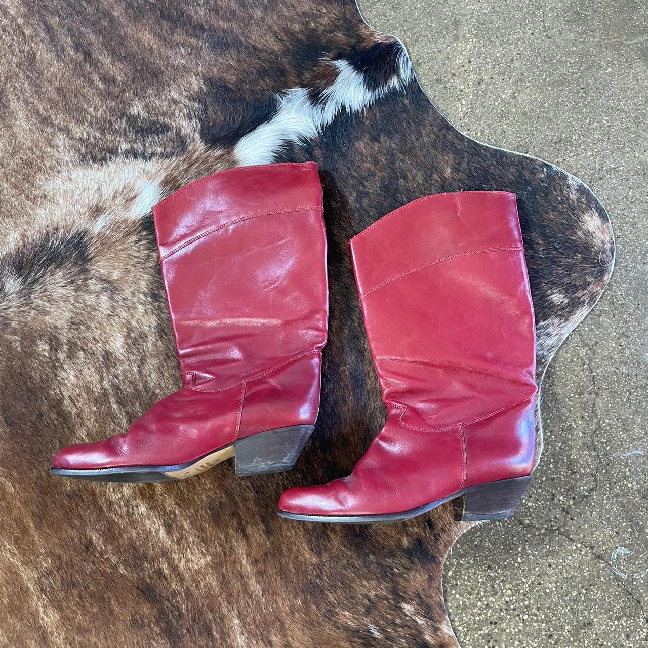 Red leather cowboy slouchy boots. 2 inch heel. Has a... - Depop