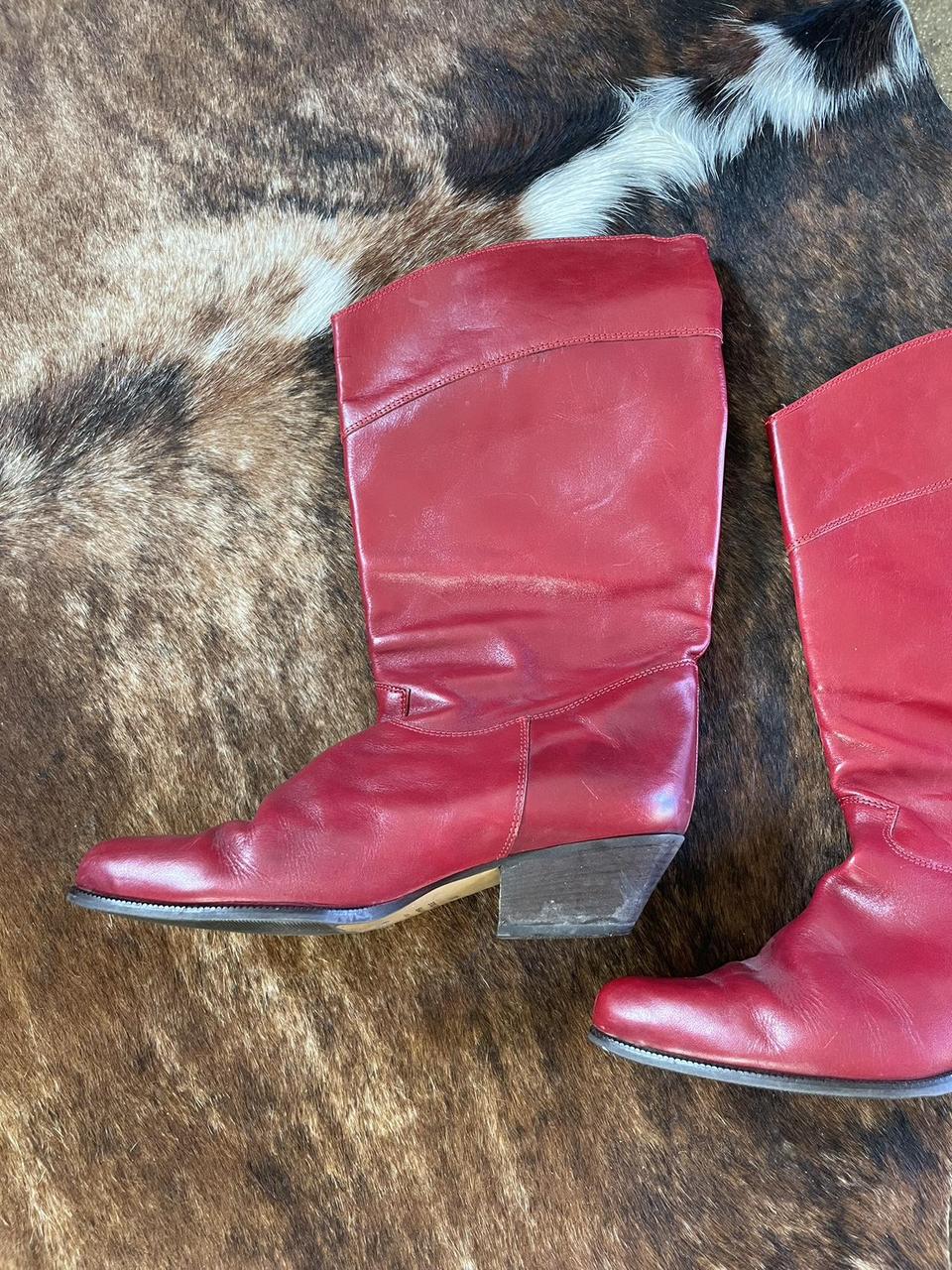 Red leather cowboy slouchy boots. 2 inch heel. Has a... - Depop