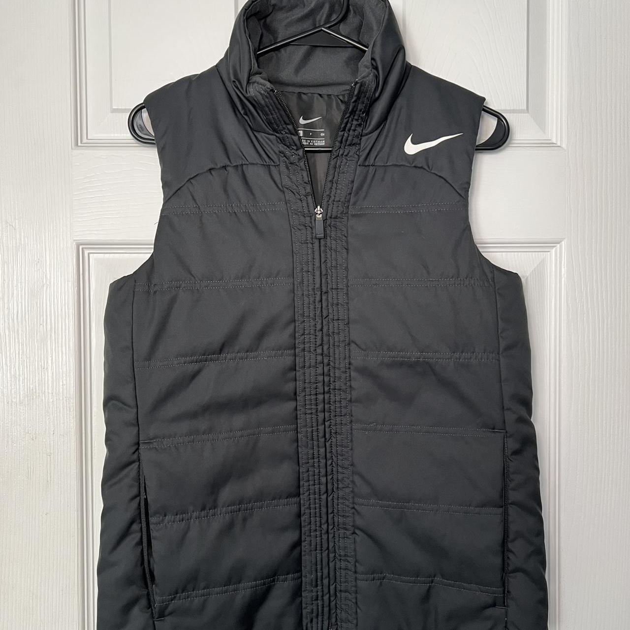 Black Nike puffer vest women’s size small... | Depop