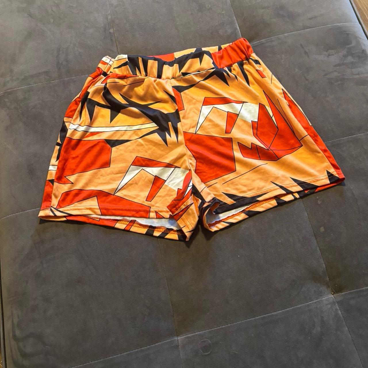 Orange and black patterned shorts Size medium #shorts | Depop