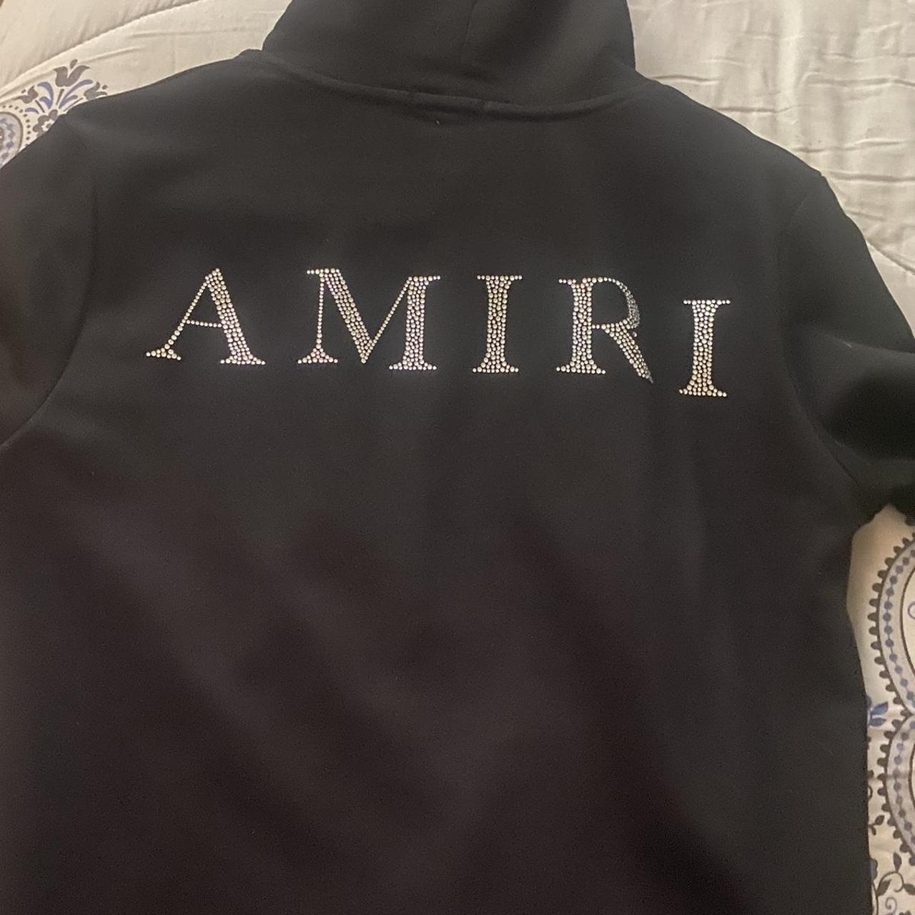 Black Amiri hoodie with silver rhinestone logo... | Depop