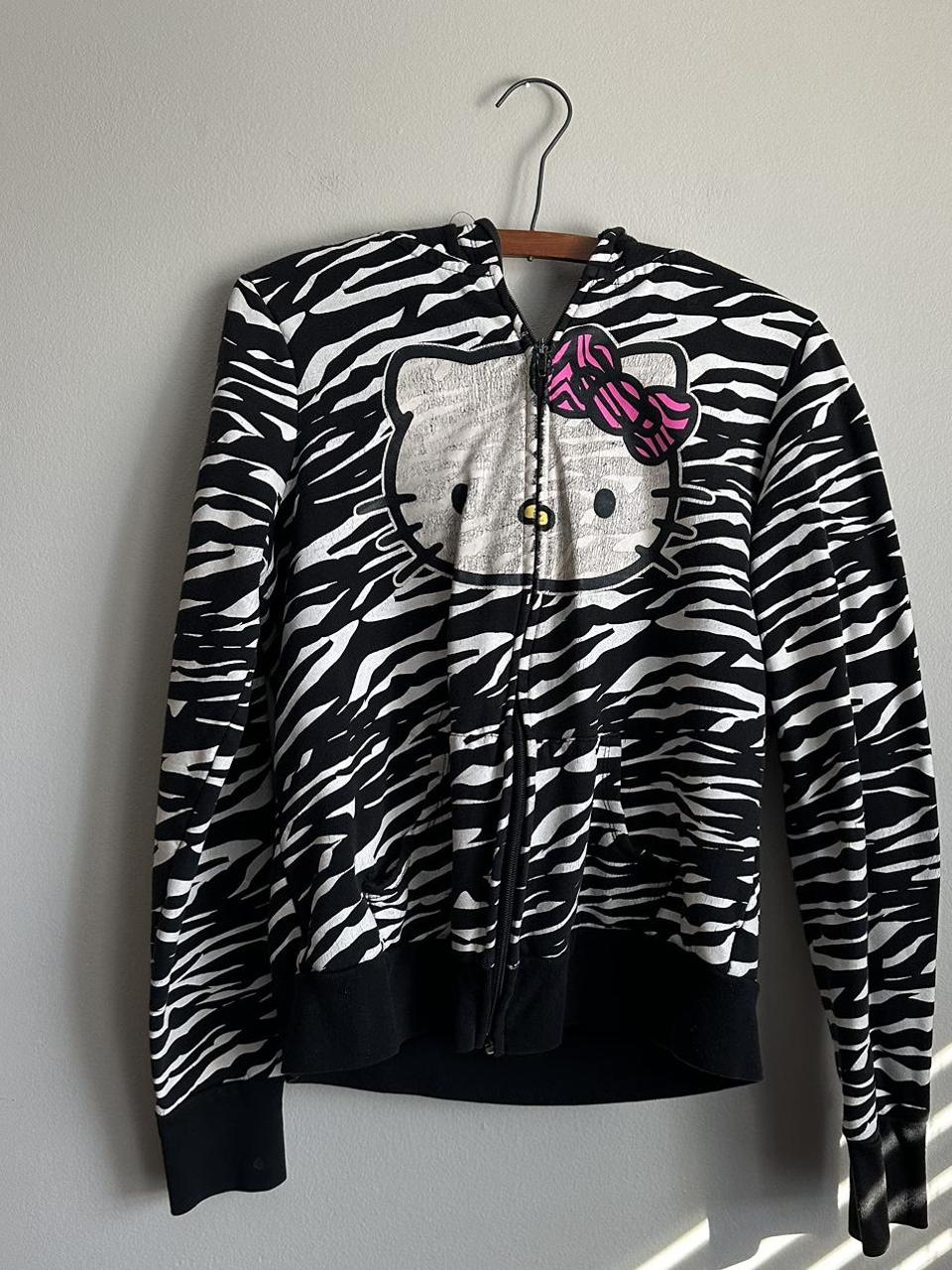 Hello kitty zebra zip up hoodie Size small Slight... - Depop